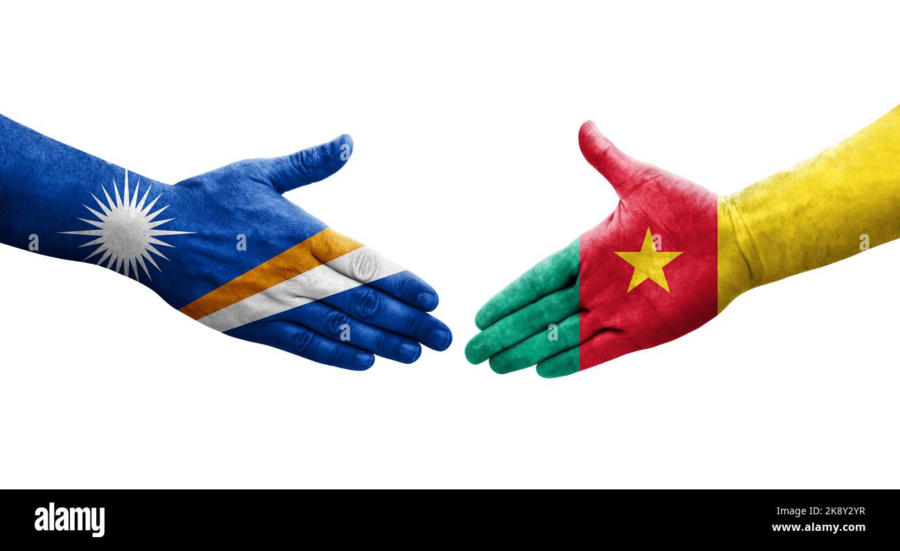 Handshake between Cameroon and Marshall Islands flags painted on hands ...