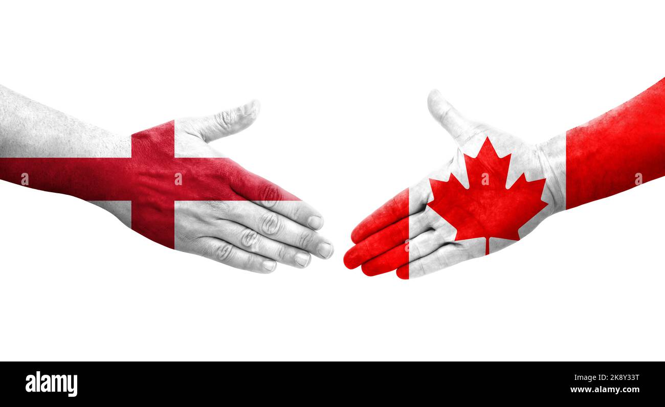 Handshake between Canada and England flags painted on hands, isolated ...