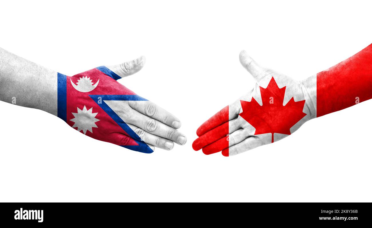 Handshake between Canada and Nepal flags painted on hands, isolated ...