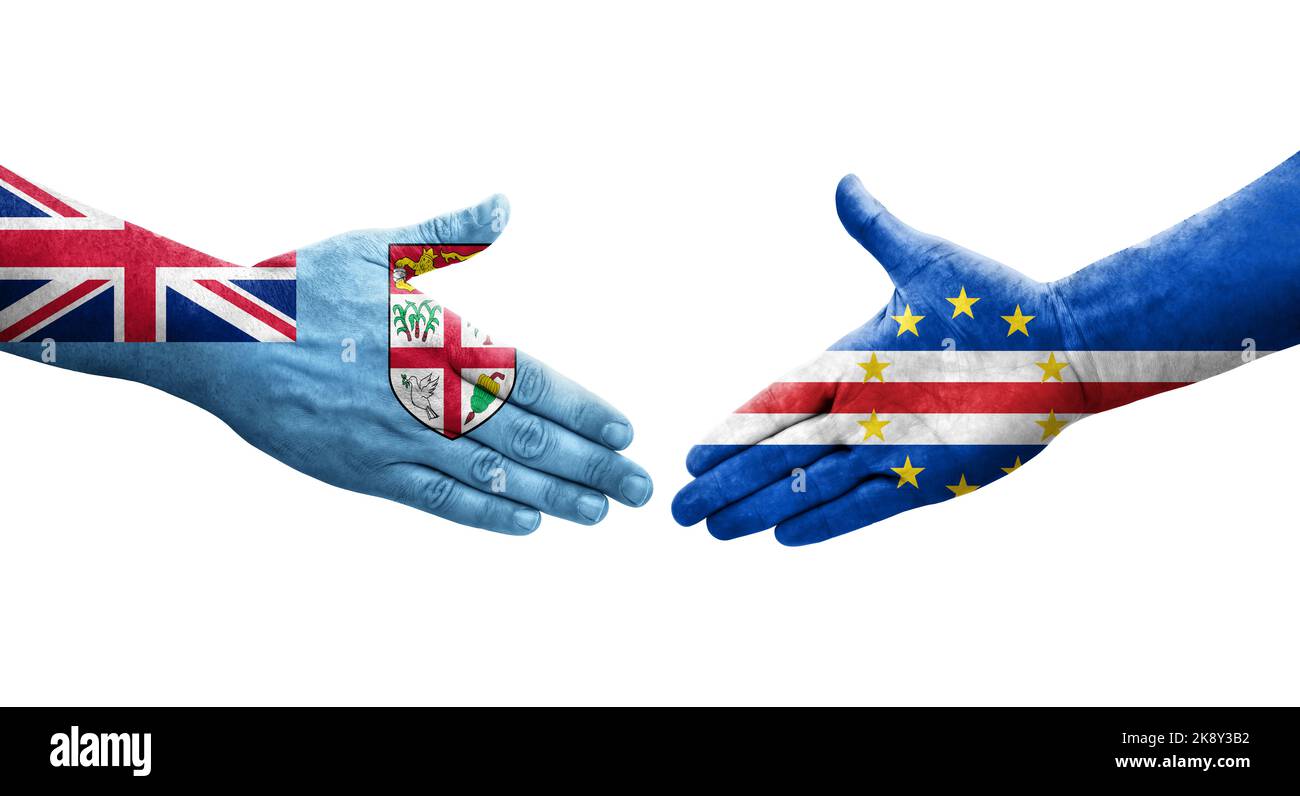 Handshake between Cape Verde and Fiji flags painted on hands, isolated ...