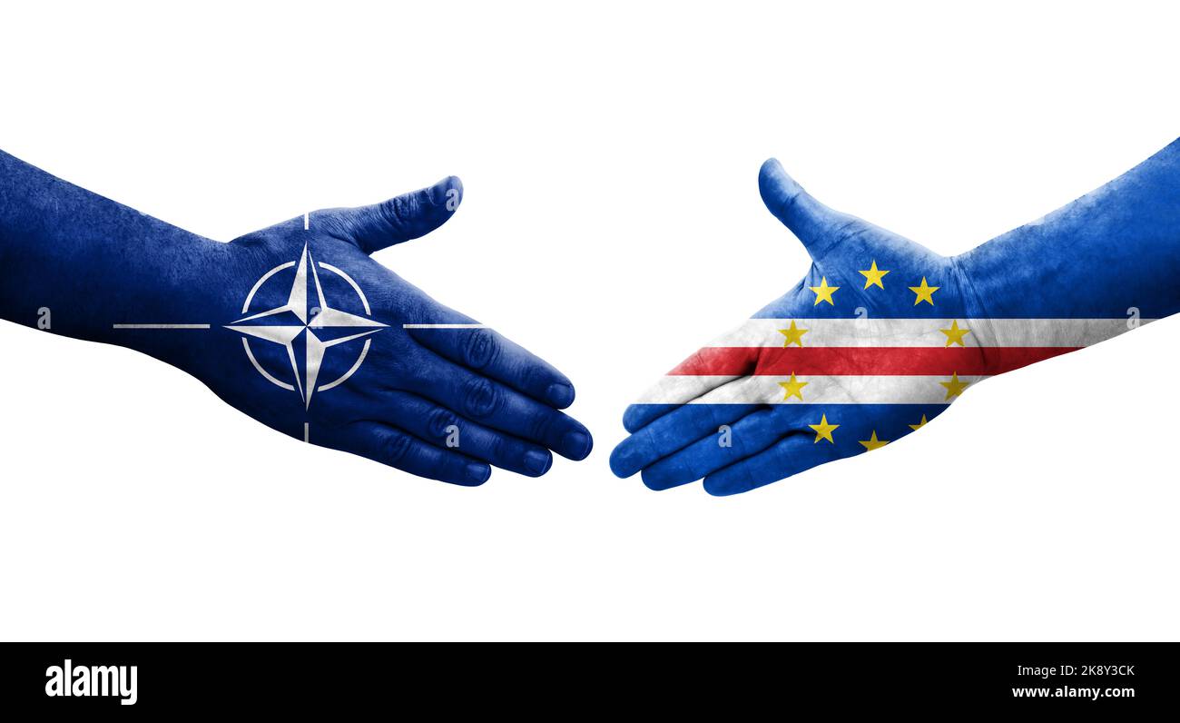 Handshake between Cape Verde and Nato flags painted on hands, isolated ...