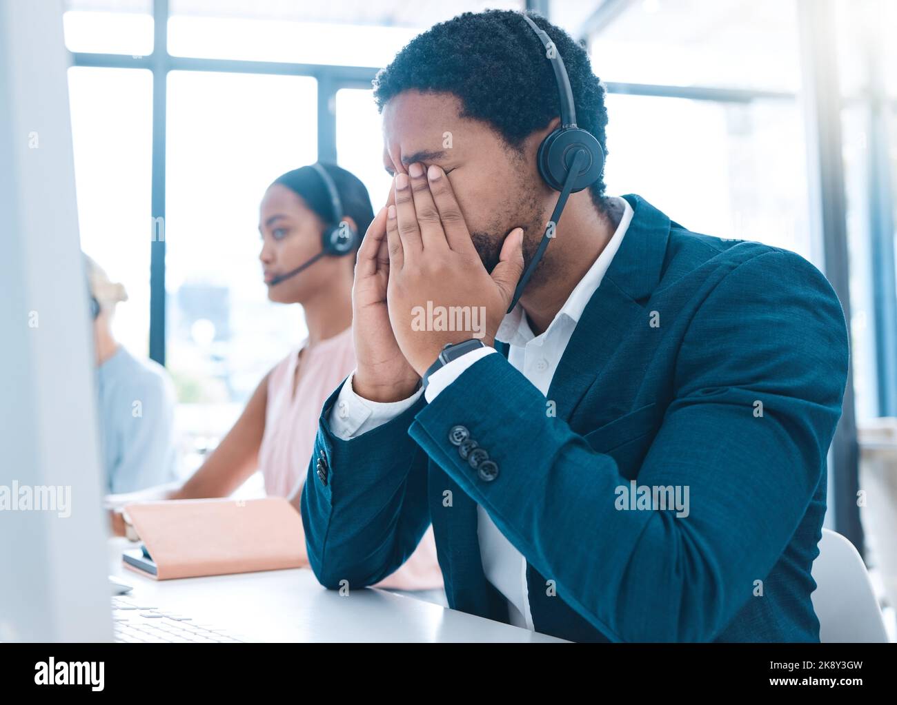 Headache tired african man working hi-res stock photography and images ...