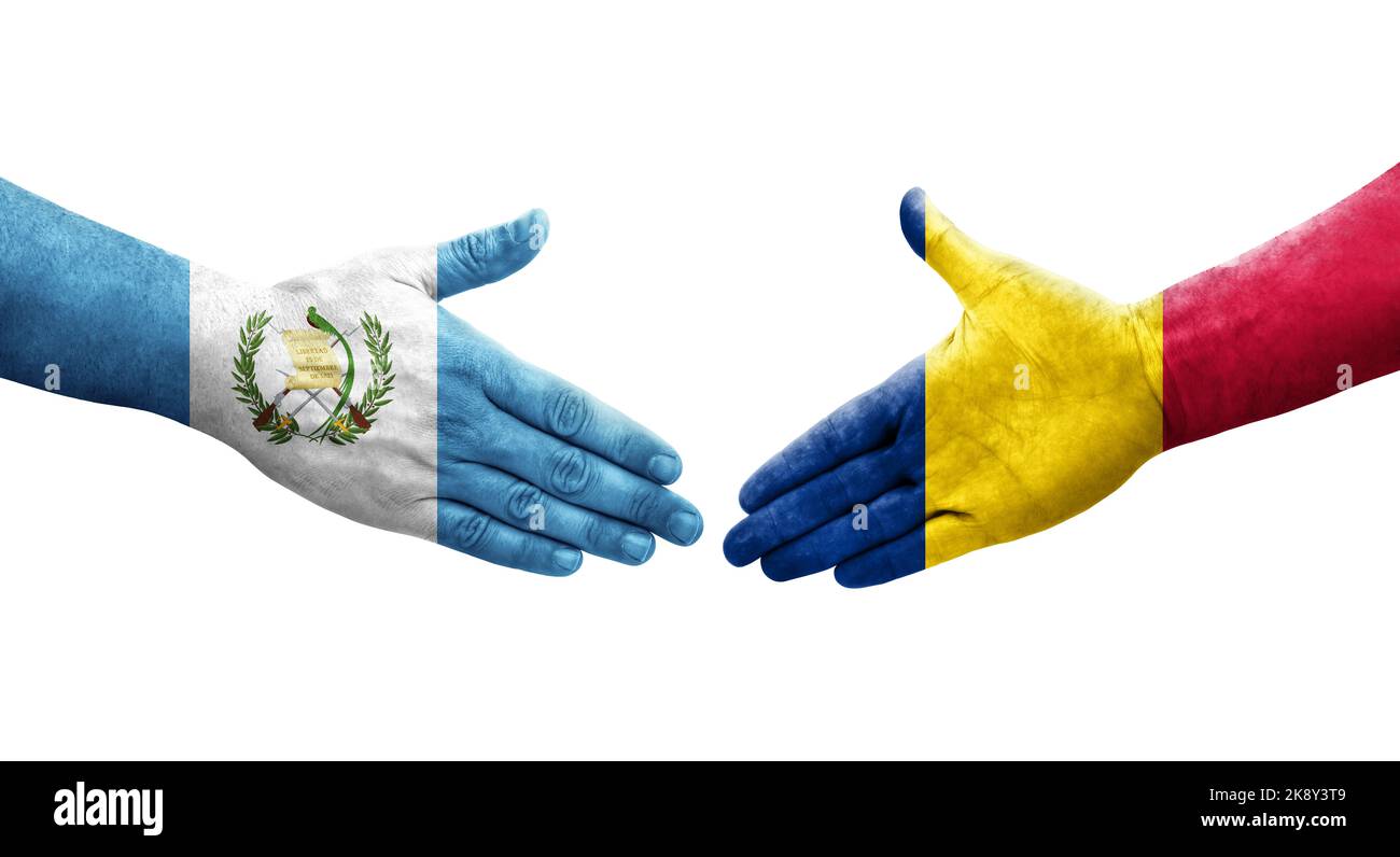 Handshake between Chad and Guatemala flags painted on hands, isolated ...