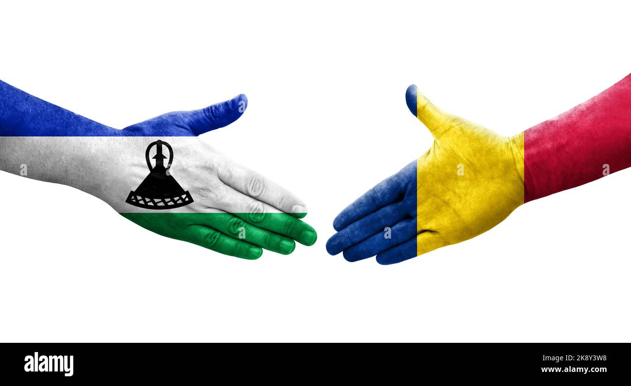 Handshake between Chad and Lesotho flags painted on hands, isolated ...