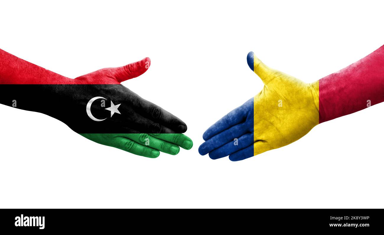 Handshake between Chad and Libya flags painted on hands, isolated ...