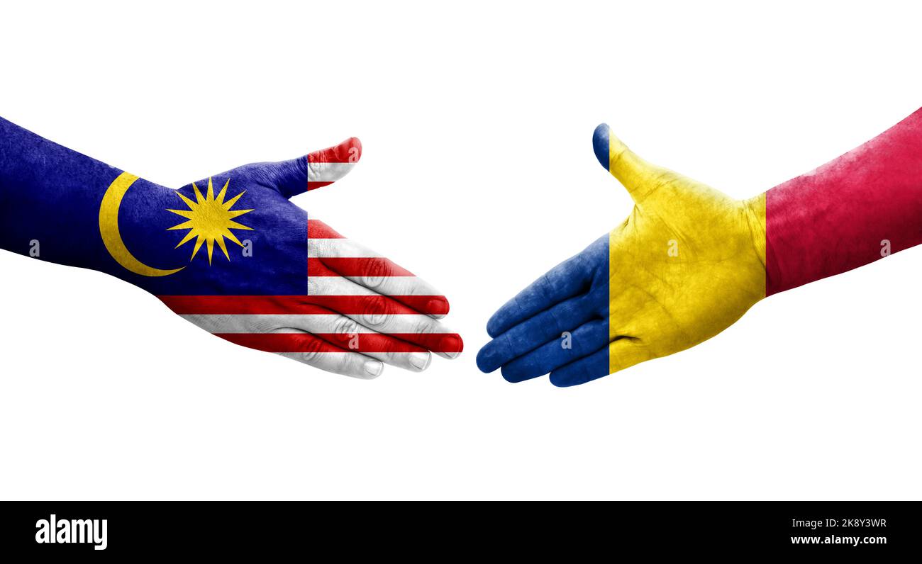 Handshake between Chad and Malaysia flags painted on hands, isolated ...