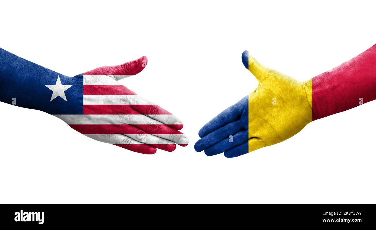 Handshake between Chad and Liberia flags painted on hands, isolated ...