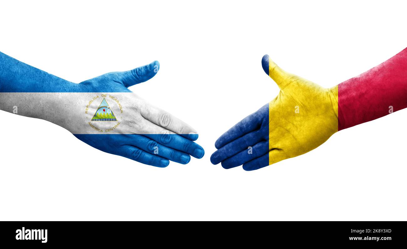 Handshake between Chad and Nicaragua flags painted on hands, isolated ...