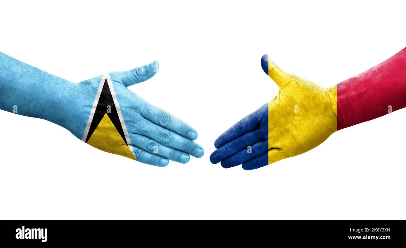 Handshake between Chad and Saint Lucia flags painted on hands, isolated ...
