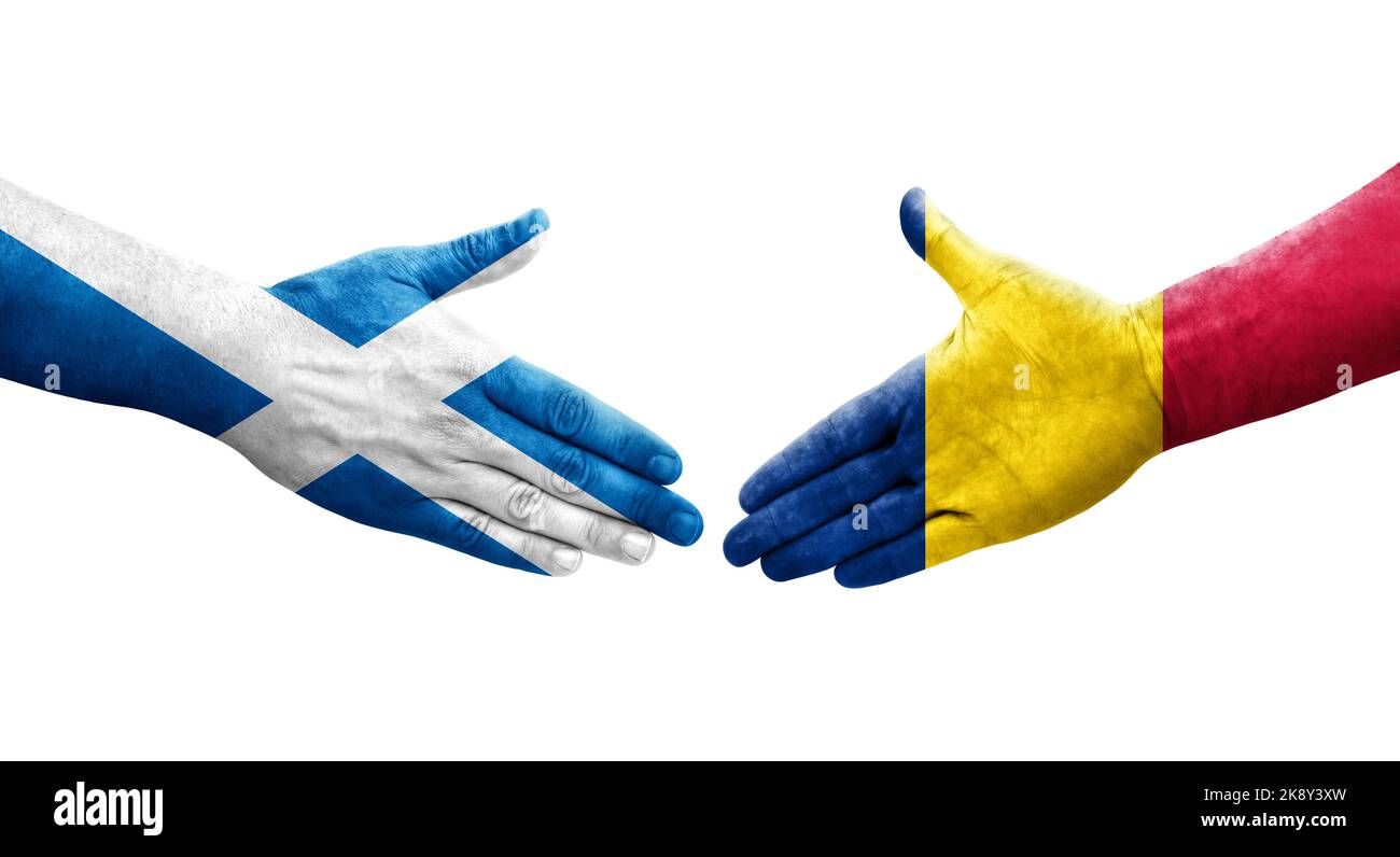 Handshake between Chad and Scotland flags painted on hands, isolated ...