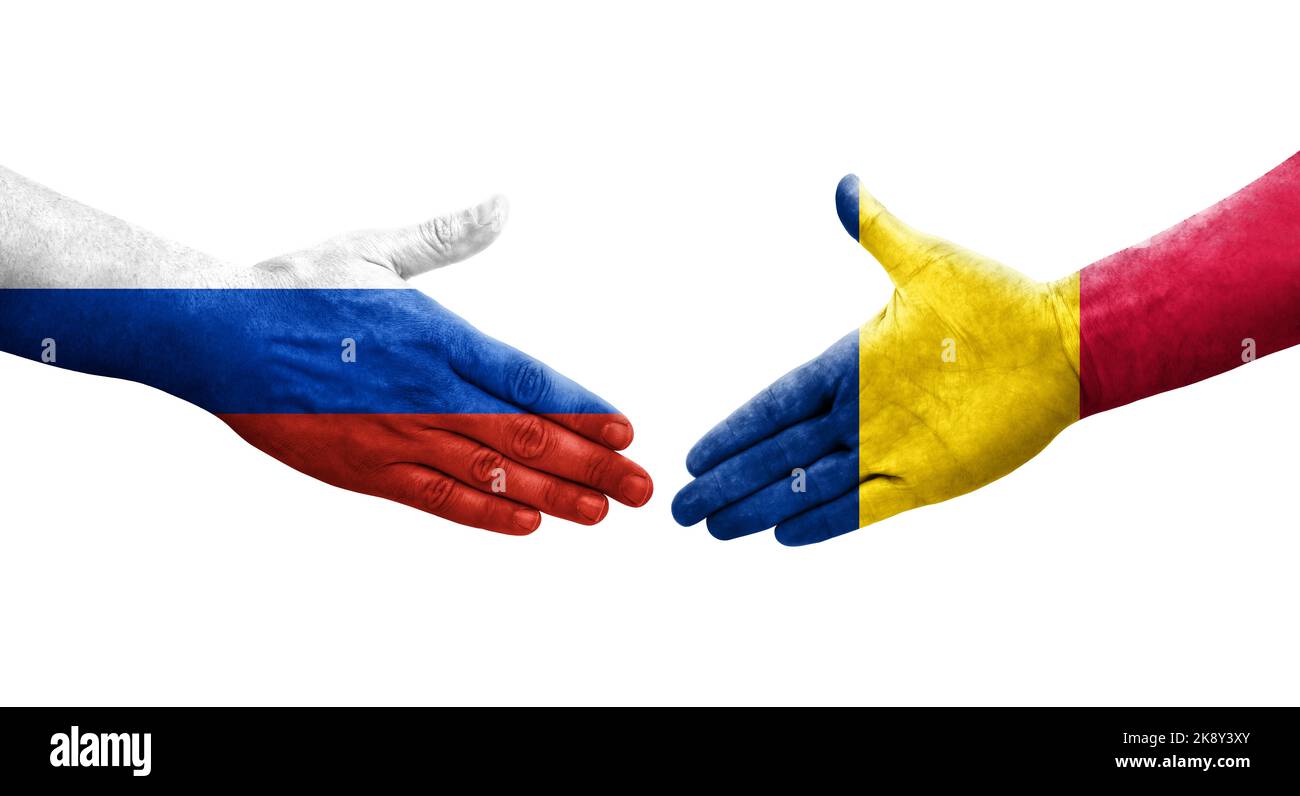 Handshake between Chad and Russia flags painted on hands, isolated ...