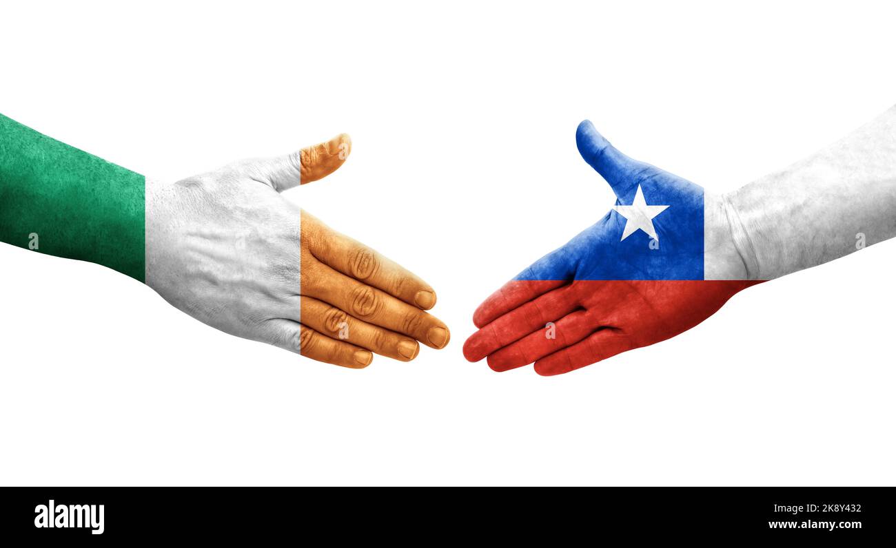 Handshake between Chile and Ireland flags painted on hands, isolated ...