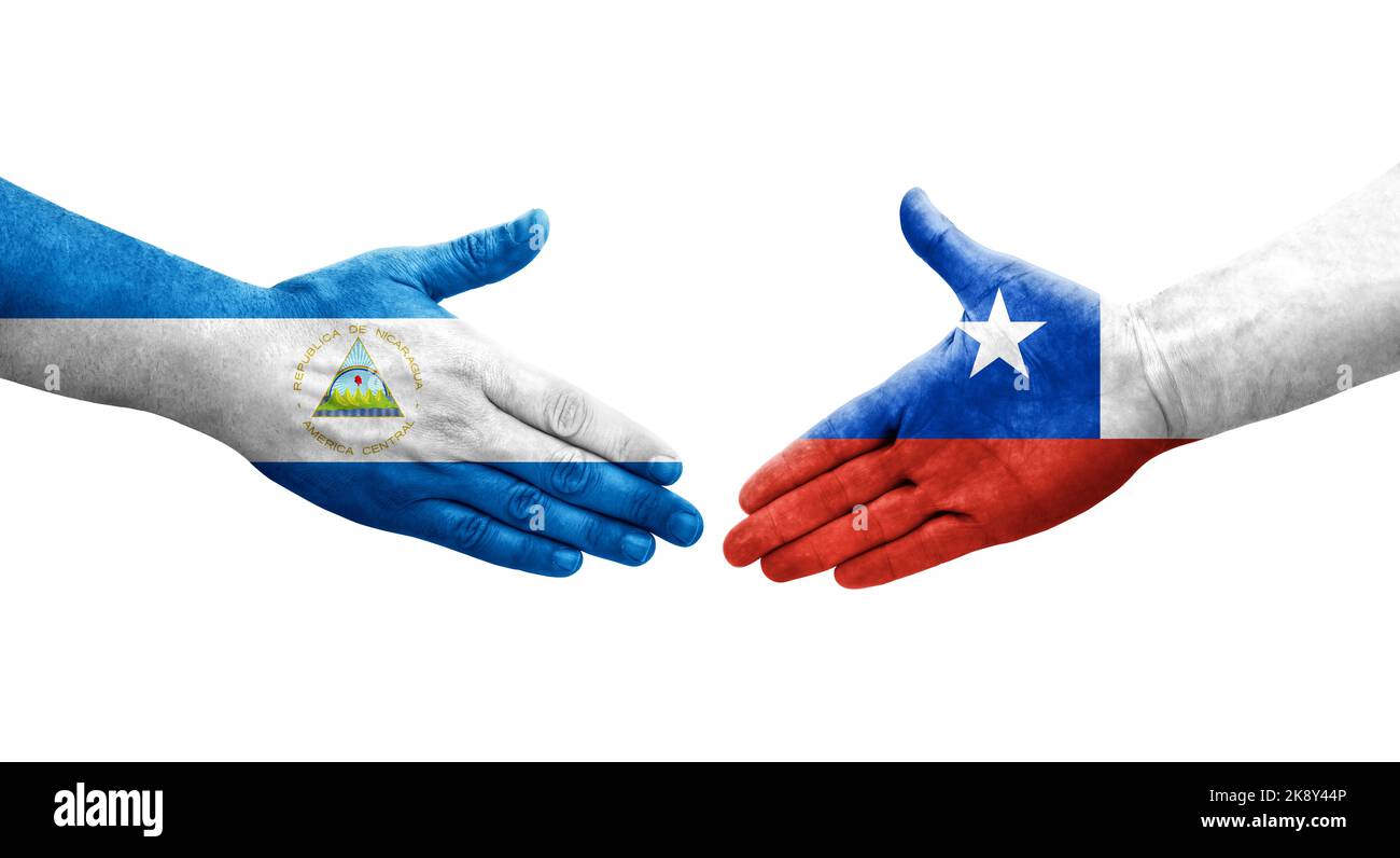 Handshake between Chile and Nicaragua flags painted on hands, isolated ...