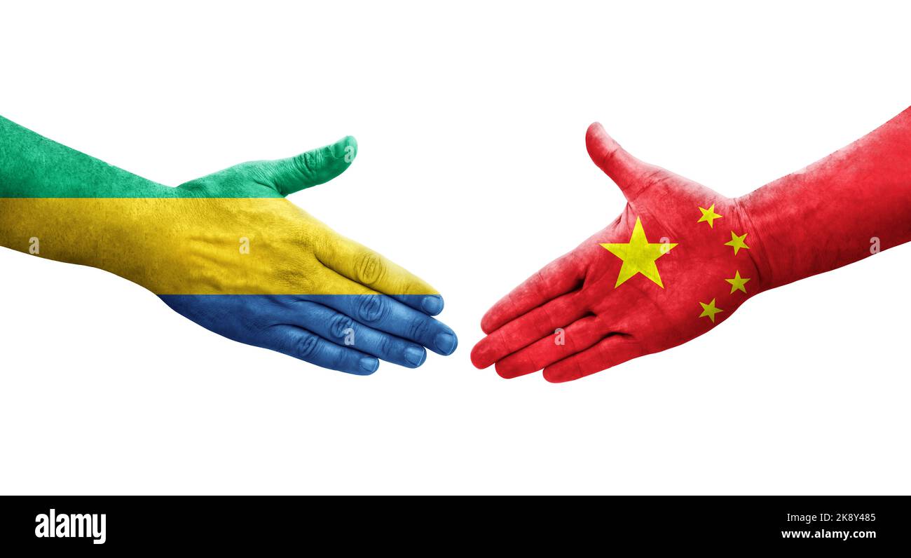 Handshake between China and Gabon flags painted on hands, isolated ...