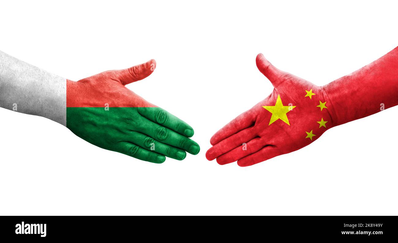 Handshake between China and Madagascar flags painted on hands, isolated ...