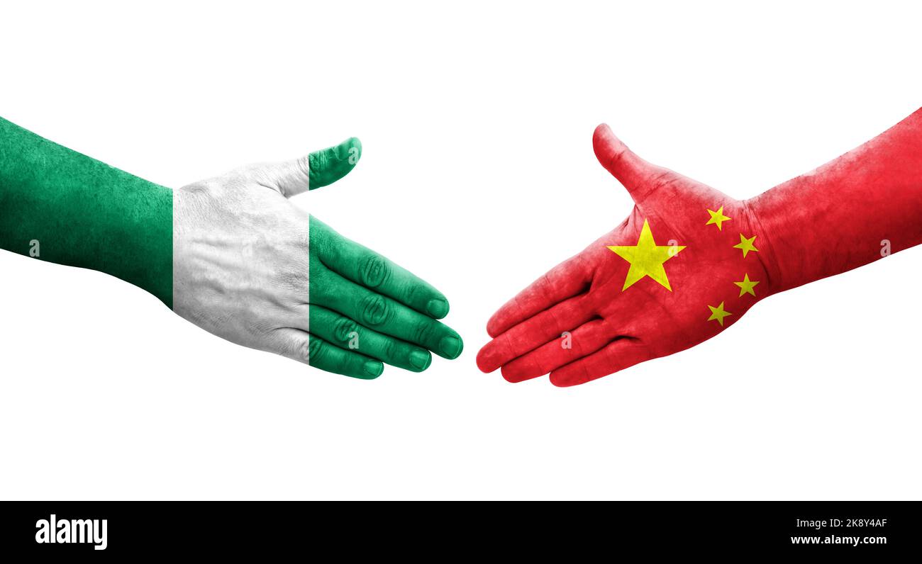 Handshake between China and Nigeria flags painted on hands, isolated ...