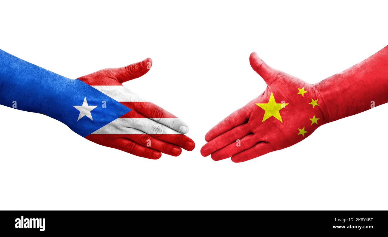 Handshake between China and Puerto Rico flags painted on hands ...