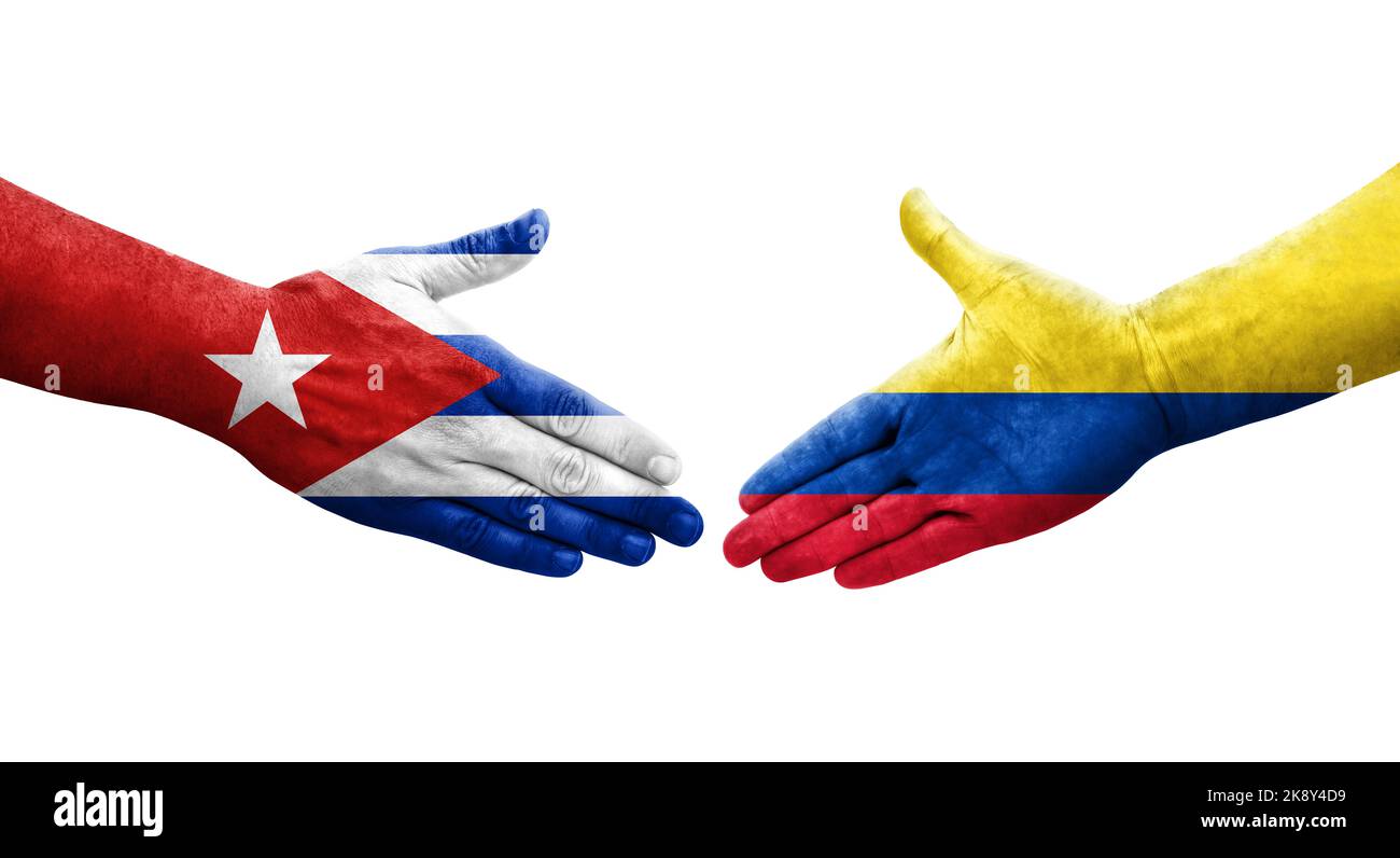 Handshake between Colombia and Cuba flags painted on hands, isolated ...
