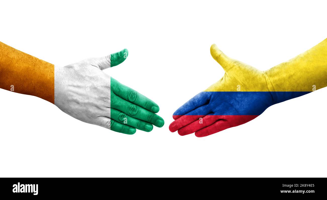 Handshake between Colombia and Ivory Coast flags painted on hands ...