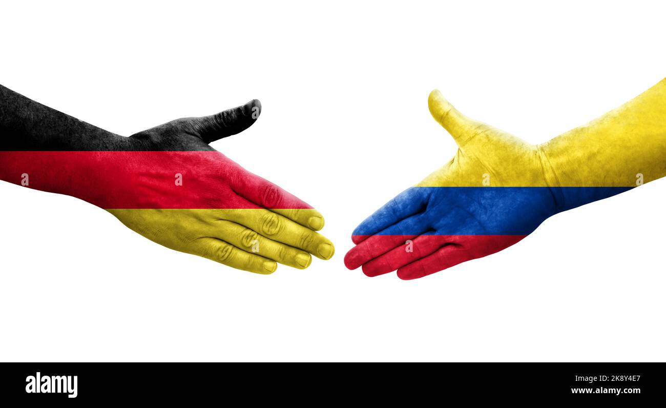Handshake between Colombia and Germany flags painted on hands, isolated ...