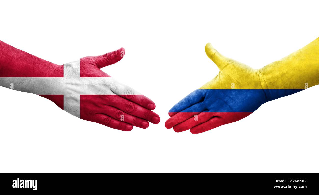Handshake between Colombia and Denmark flags painted on hands, isolated ...