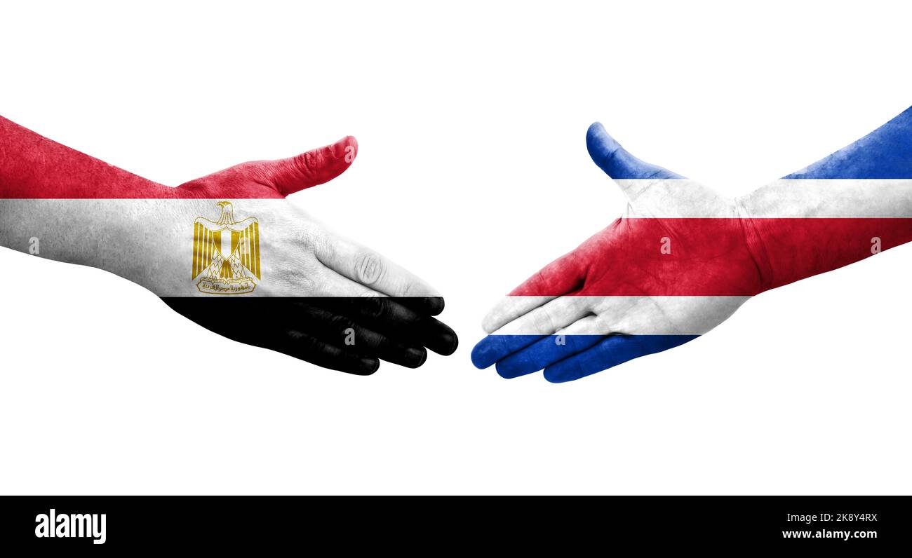 Handshake between Costa Rica and Egypt flags painted on hands, isolated ...