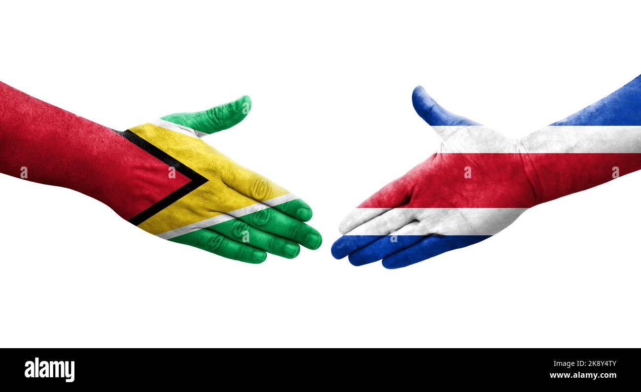 Handshake between Costa Rica and Guyana flags painted on hands ...