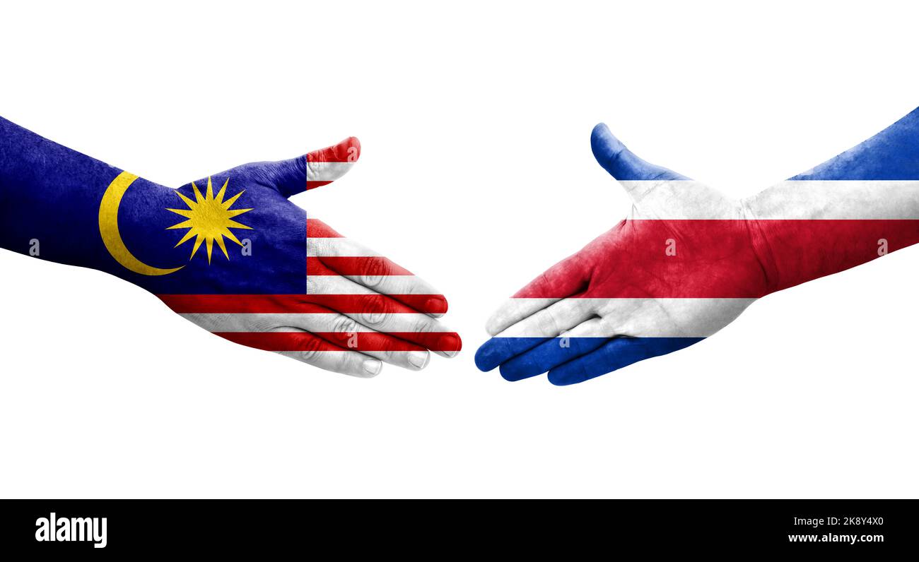 Handshake between Costa Rica and Malaysia flags painted on hands ...