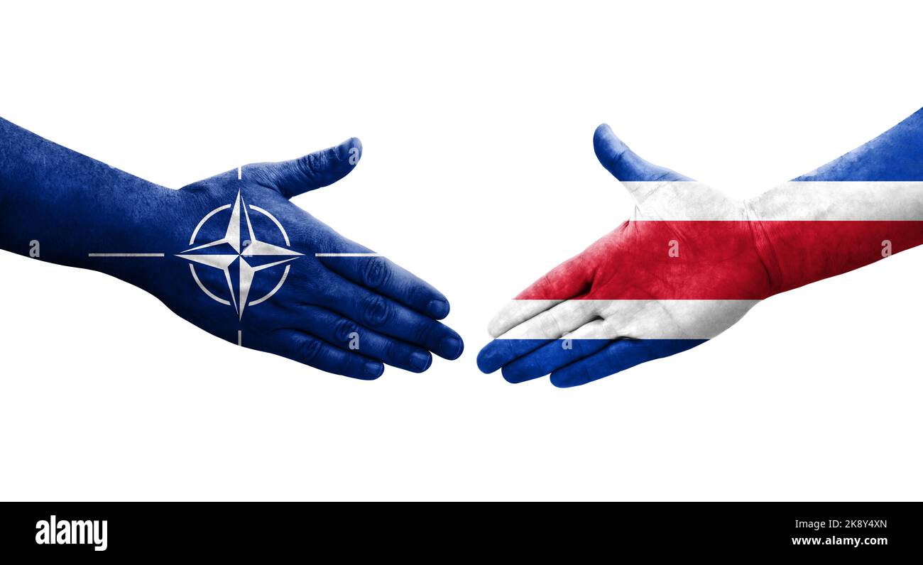 Handshake between Costa Rica and Nato flags painted on hands, isolated ...