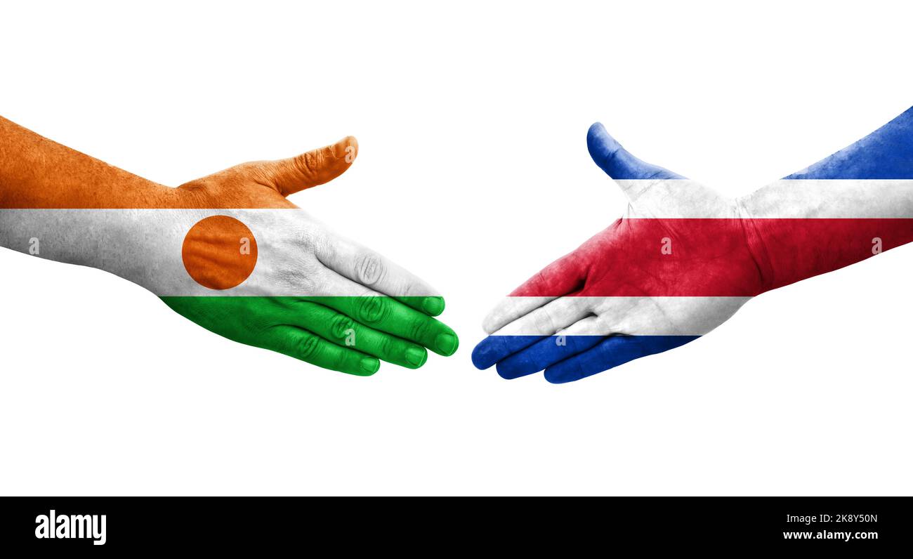 Handshake between Costa Rica and Niger flags painted on hands, isolated ...