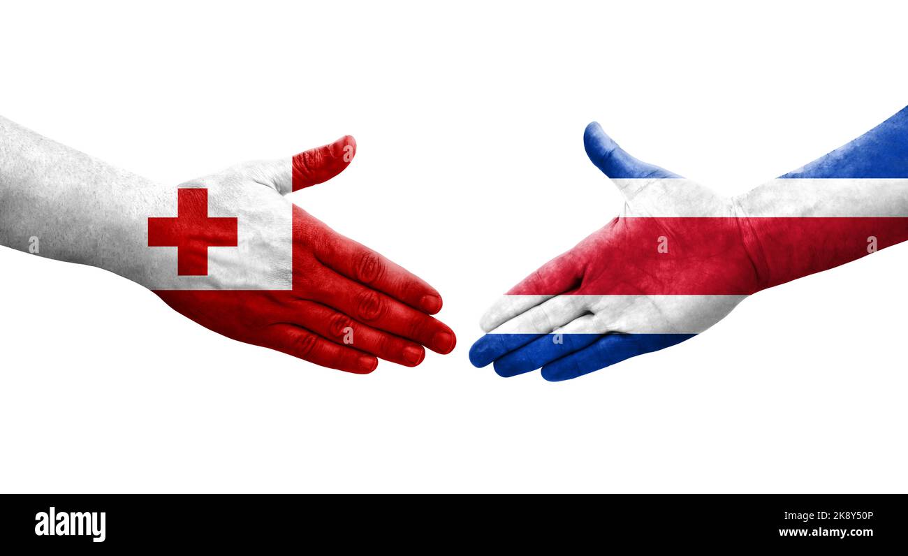 Handshake between Costa Rica and Tonga flags painted on hands, isolated ...