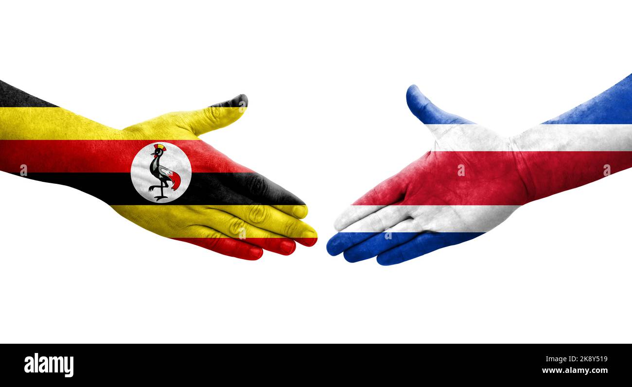 Handshake between Costa Rica and Uganda flags painted on hands ...