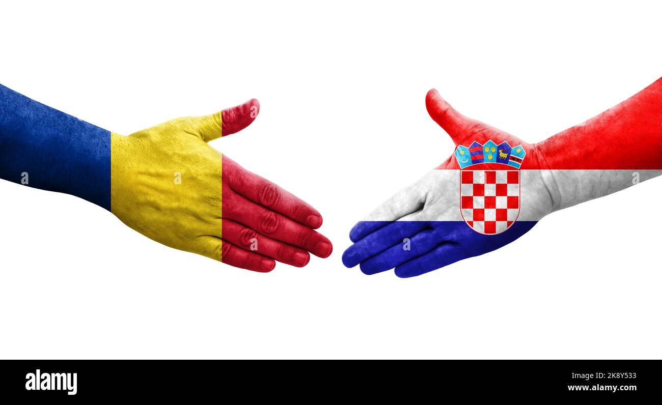 Handshake between Croatia and Romania flags painted on hands, isolated ...