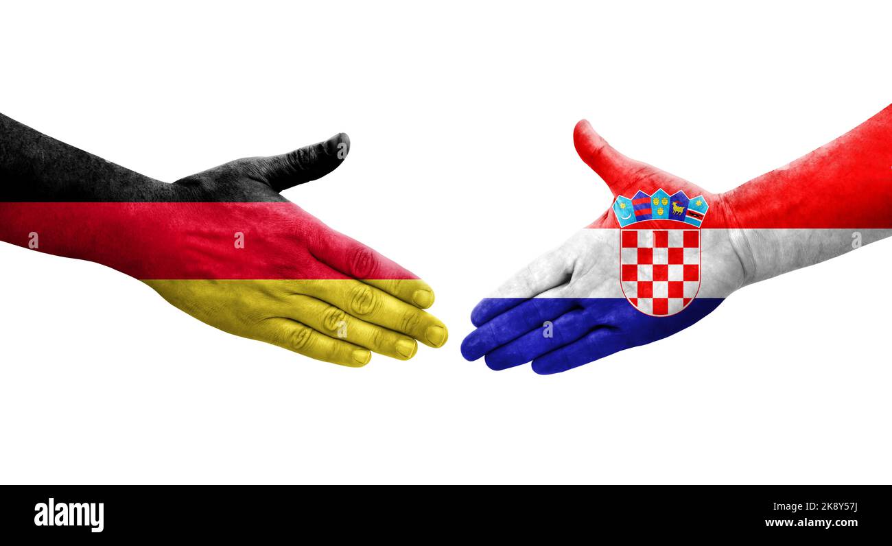 Handshake between Croatia and Germany flags painted on hands, isolated ...