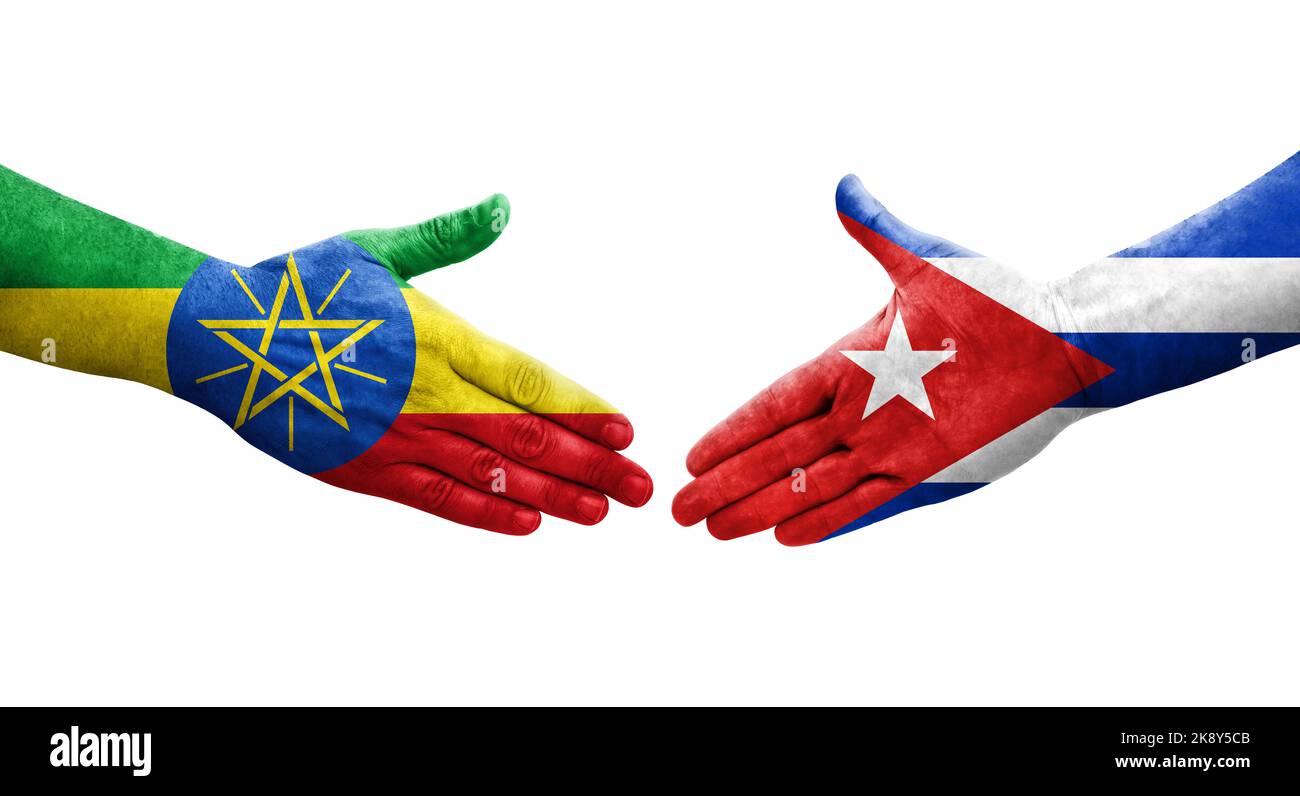 Handshake between Cuba and Ethiopia flags painted on hands, isolated ...