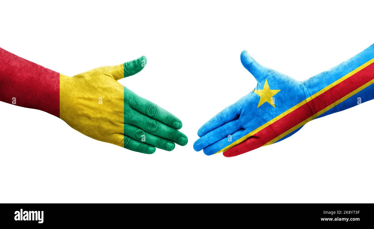 Handshake between Dr Congo and Guinea flags painted on hands, isolated ...