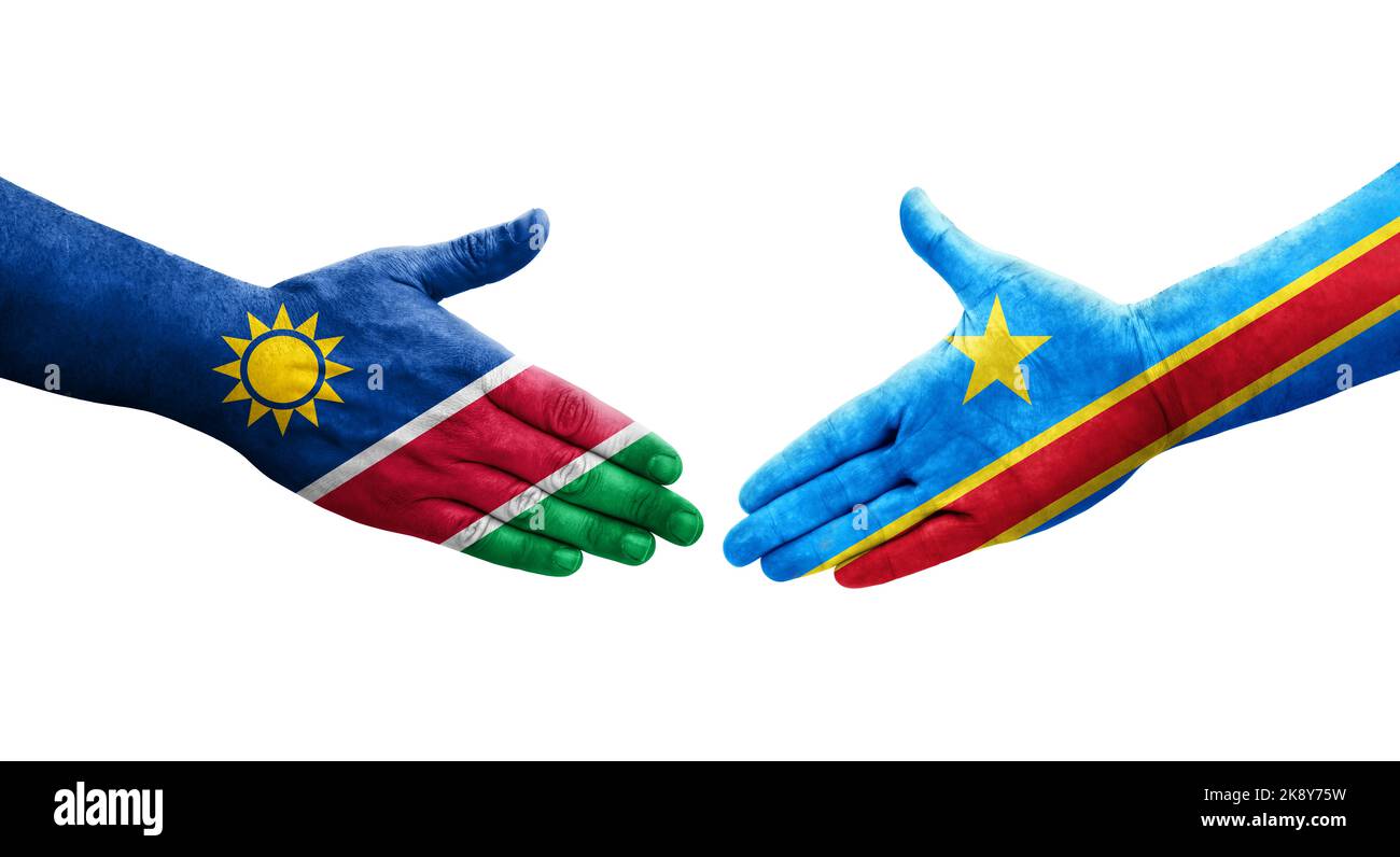 Handshake between Dr Congo and Namibia flags painted on hands, isolated ...