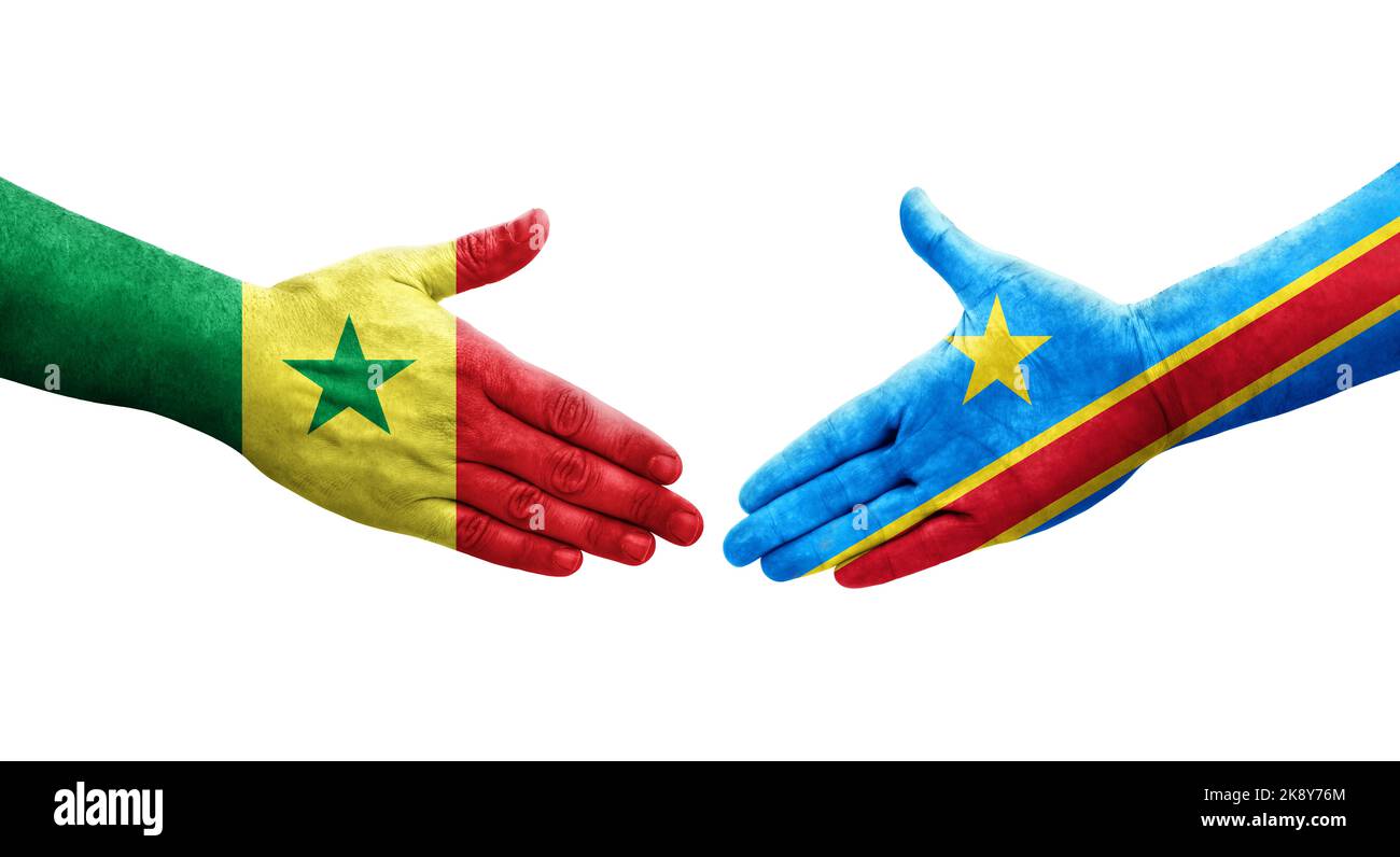 Handshake between Dr Congo and Senegal flags painted on hands, isolated ...