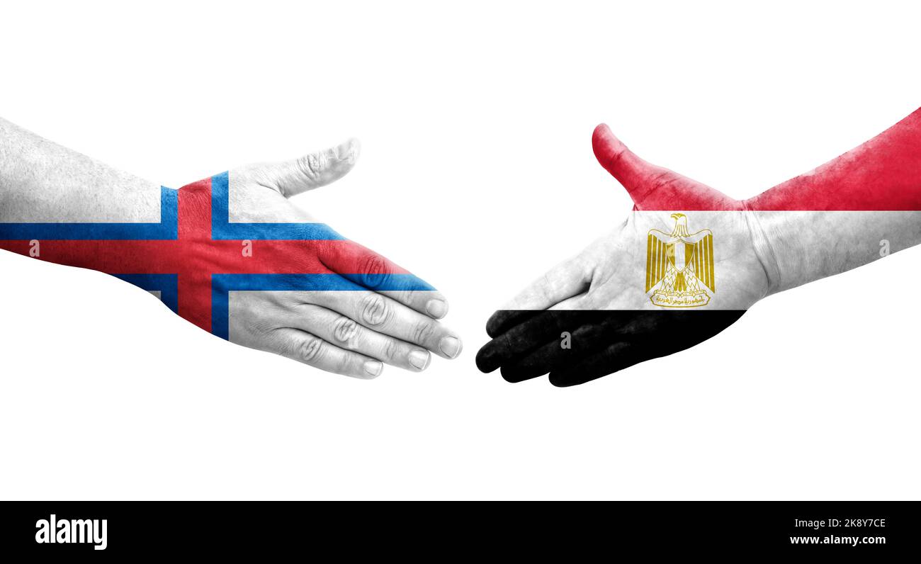 Handshake between Egypt and Faroe Islands flags painted on hands ...