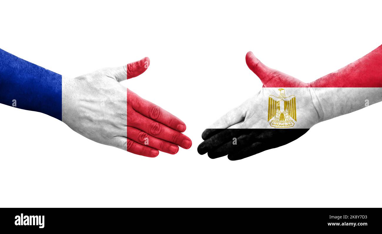 Handshake between Egypt and France flags painted on hands, isolated ...