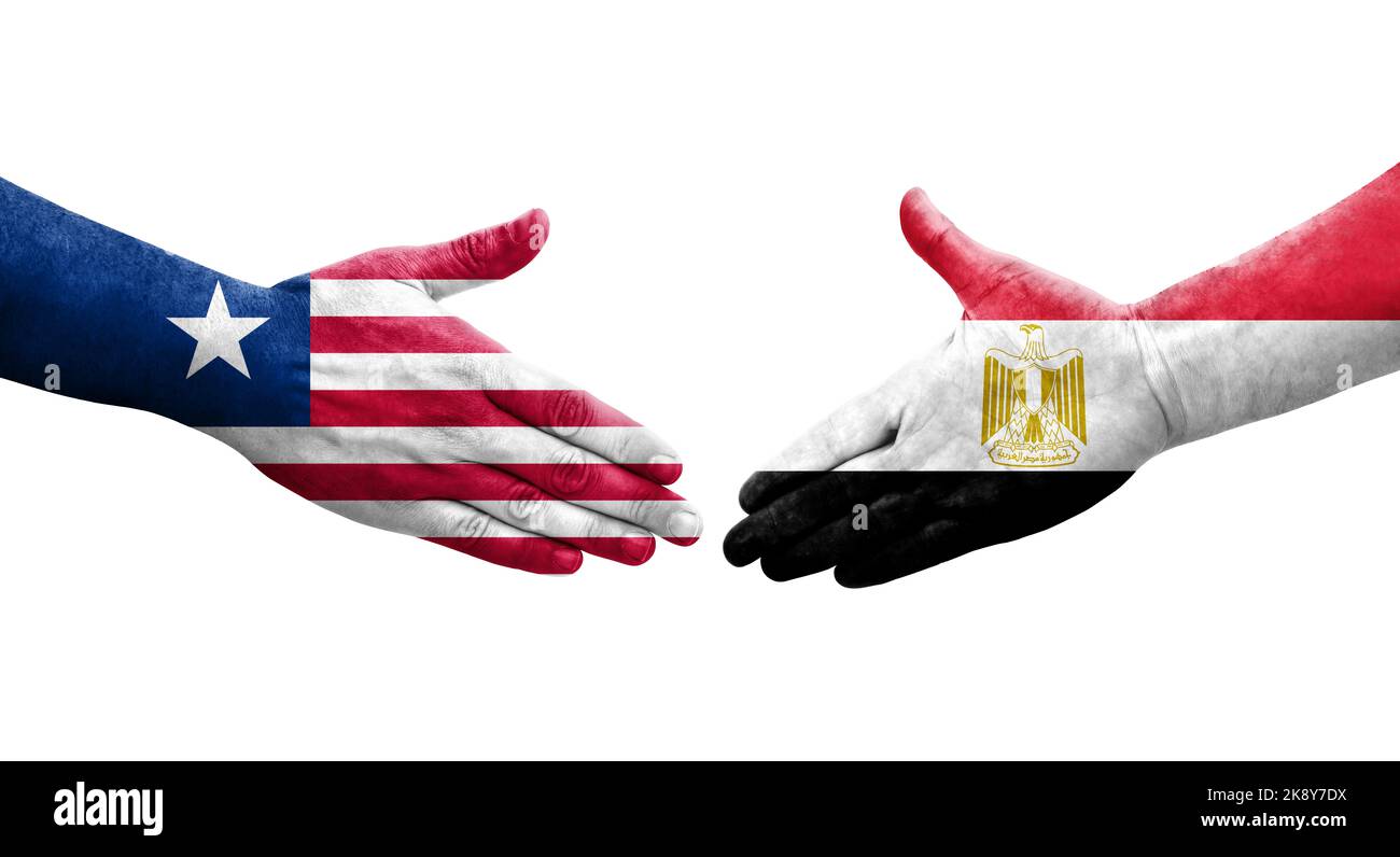 Handshake between Egypt and Liberia flags painted on hands, isolated ...
