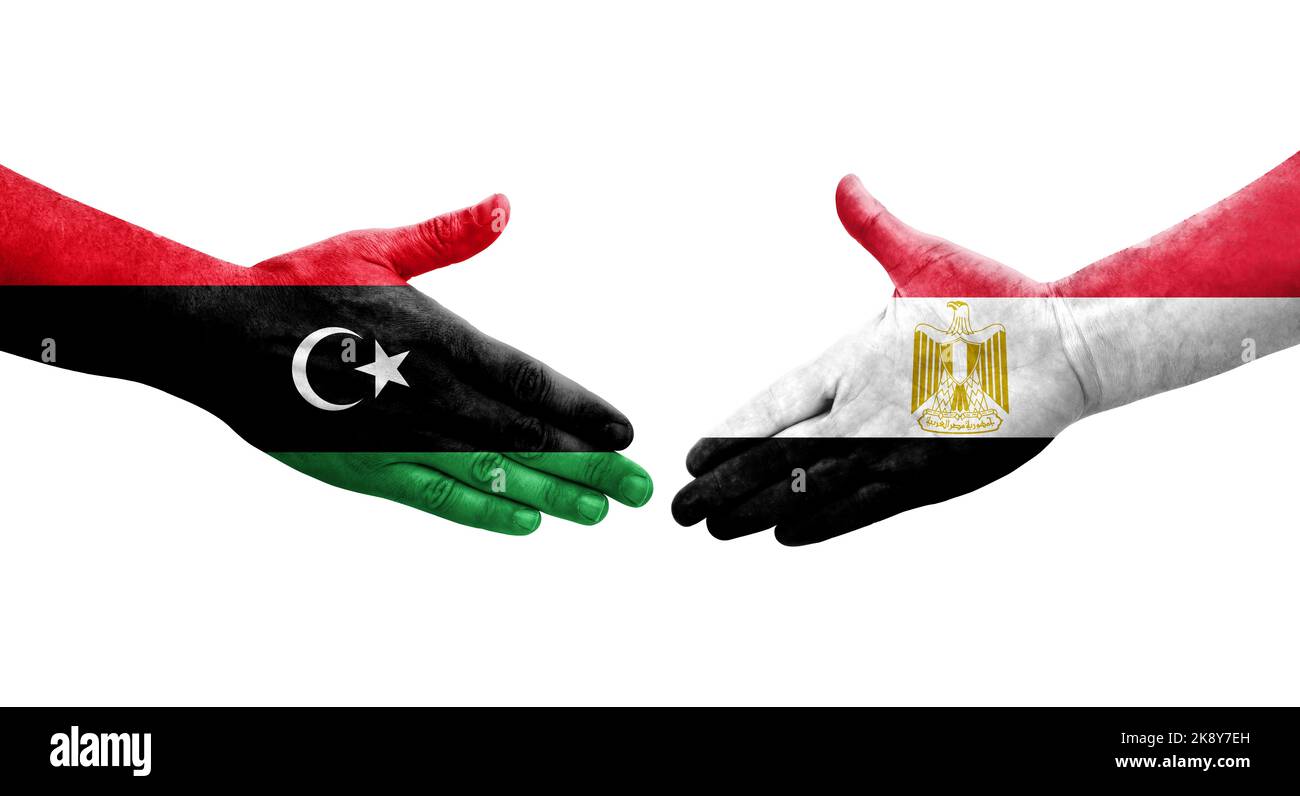 Handshake between Egypt and Libya flags painted on hands, isolated ...