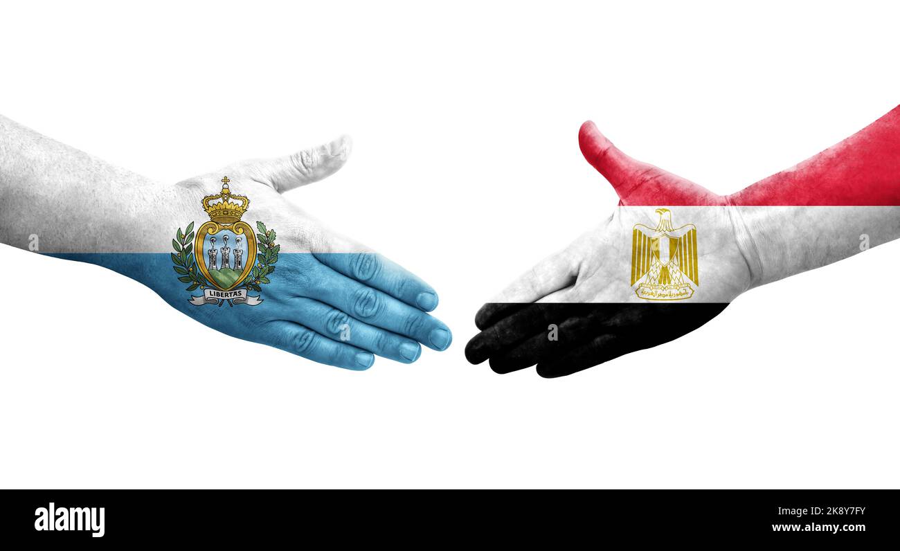 Handshake between Egypt and San Marino flags painted on hands, isolated ...