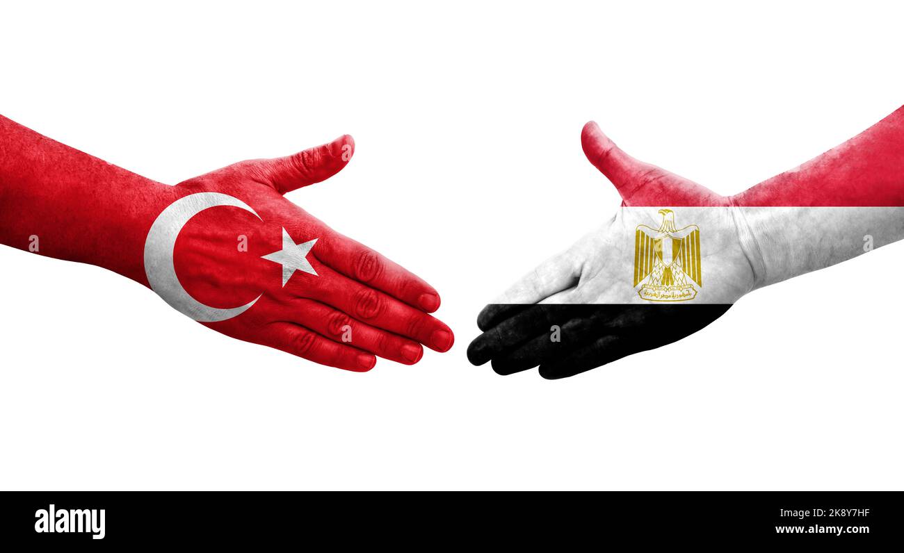 Handshake between Egypt and Turkey flags painted on hands, isolated ...