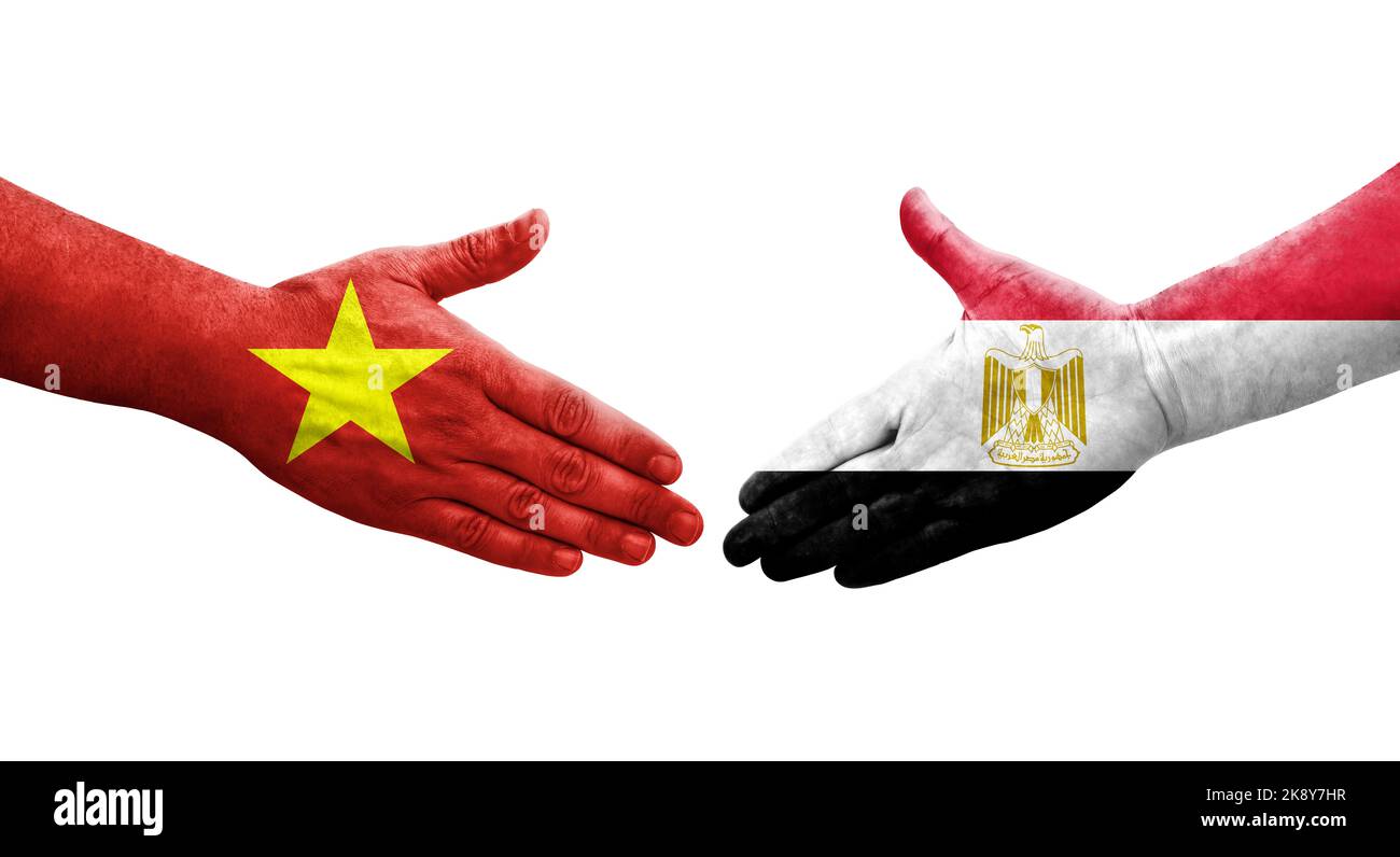 Handshake between Egypt and Vietnam flags painted on hands, isolated ...