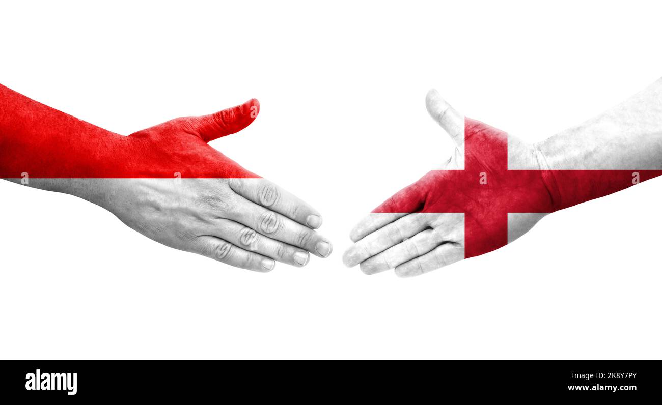 Handshake between England and Indonesia flags painted on hands ...