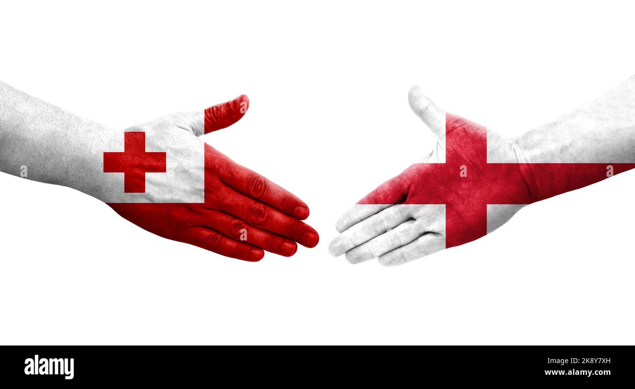 Handshake between England and Tonga flags painted on hands, isolated ...