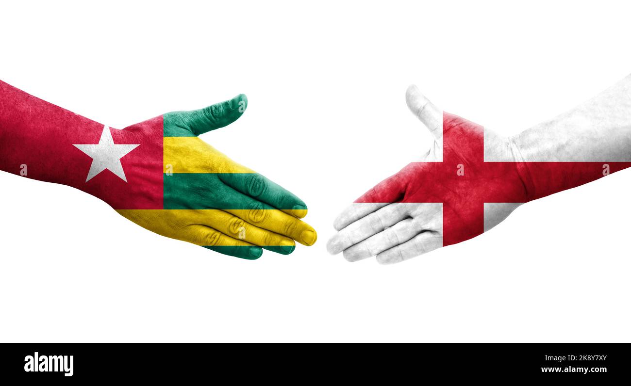 Handshake between England and Togo flags painted on hands, isolated ...
