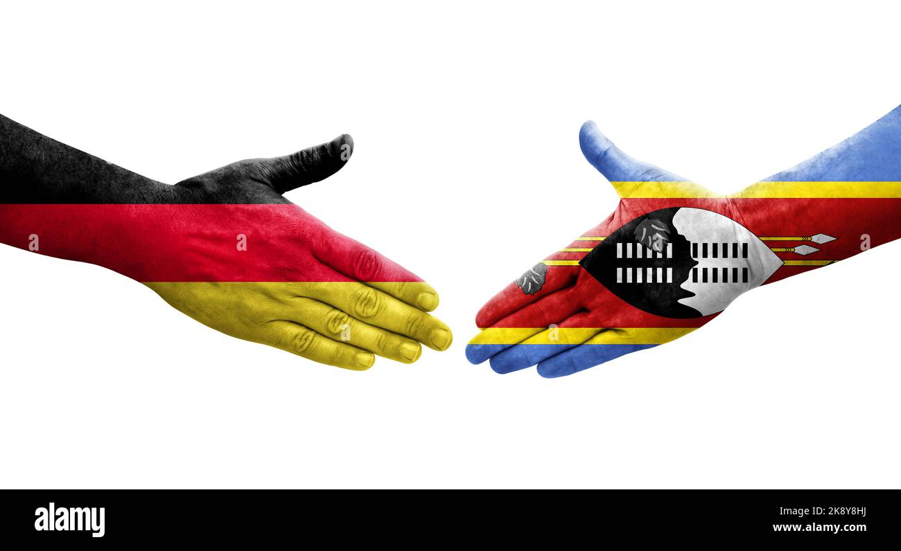 Handshake between Eswatini and Germany flags painted on hands, isolated ...