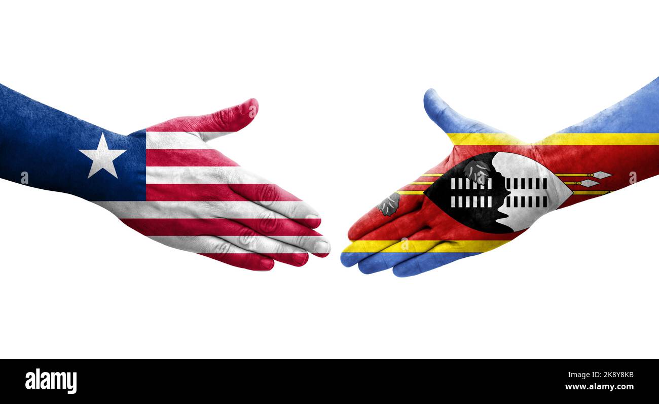 Handshake between Eswatini and Liberia flags painted on hands, isolated ...